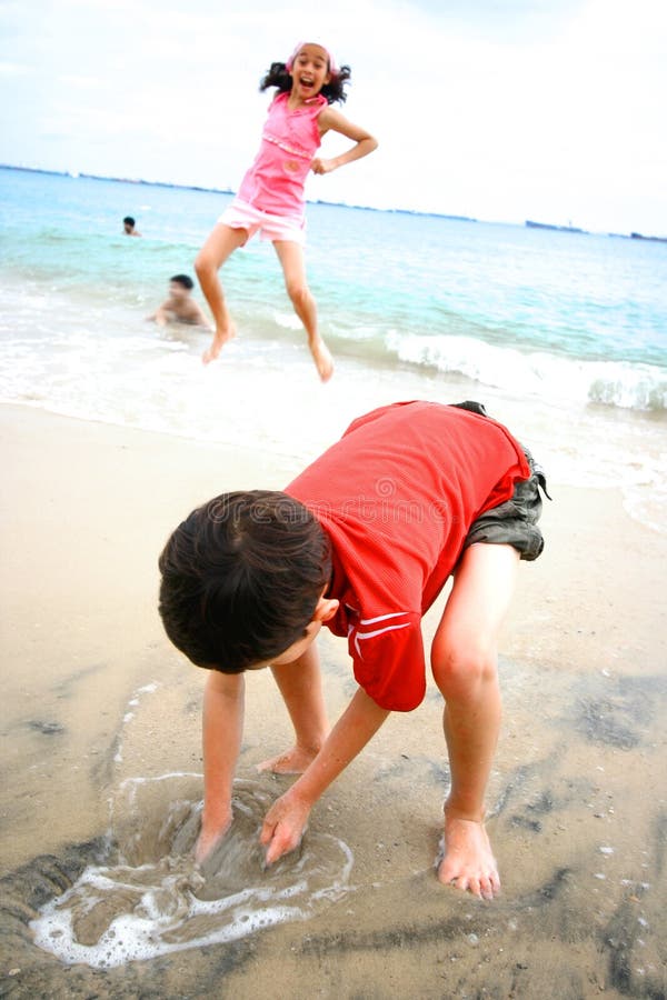 Fun at a tropical beach stock image. Image of children - 4078065
