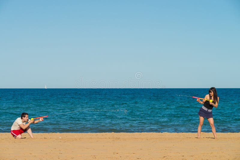 Fun water gun fight stock image. Image of water, caucasian - 41009329