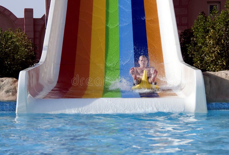 Fun on water slide stock photo. Image of construction - 13196614