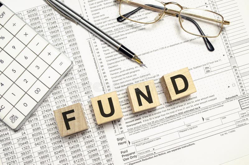 FUND Word Written in Wooden Cubes on Documents Stock Photo - Image of ...