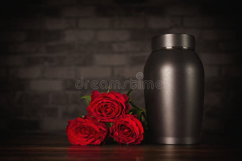 Funeral Mourning Urn Next To a Bunch of Roses. Stock Image - Image of ...