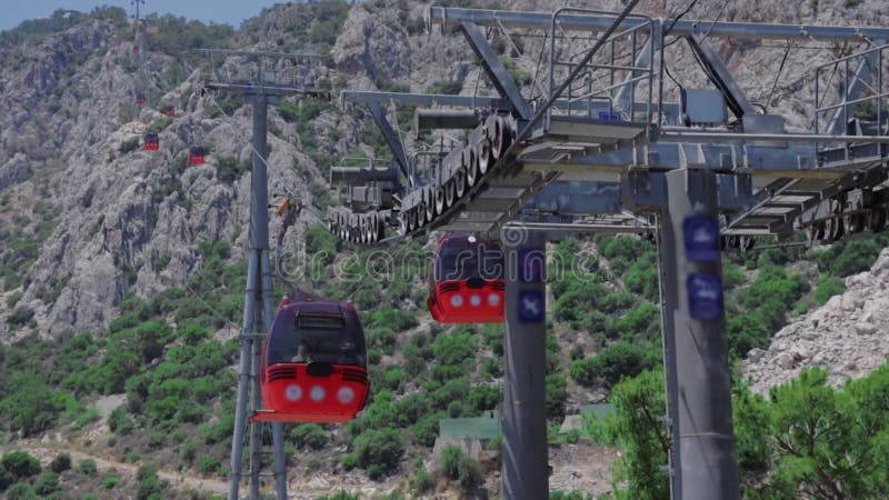 Funiculars Move Along the Cable Car on the Backdrop of Mountains Stock ...