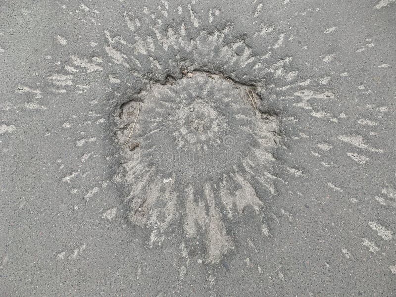 Funnel on the Pavement from the Explosion of a Shell. Traces of the War ...