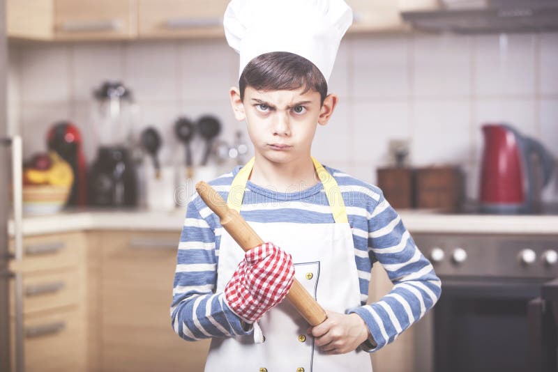 Angry Boy Chef in the Kitchen Stock Photo - Image of roller, home ...