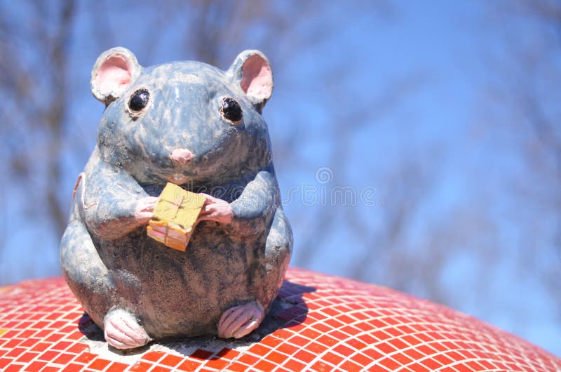 Funny Artificial Mouse with Cheese Sitting on the Roof Stock Image ...