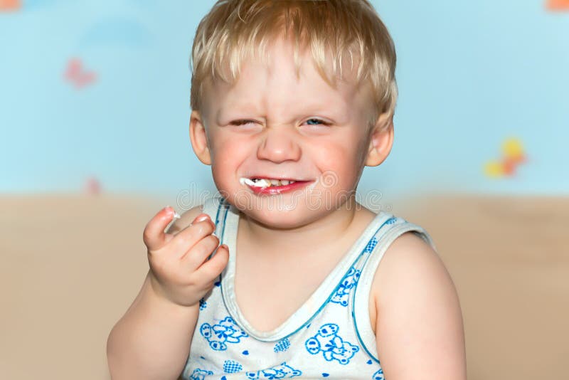 Funny baby grimaces. stock photo. Image of portrait, caucasian - 70996650