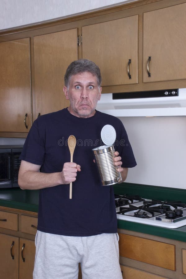 Funny Bachelor Man Cooking Dinner Eat from Tin Can Stock Image - Image ...