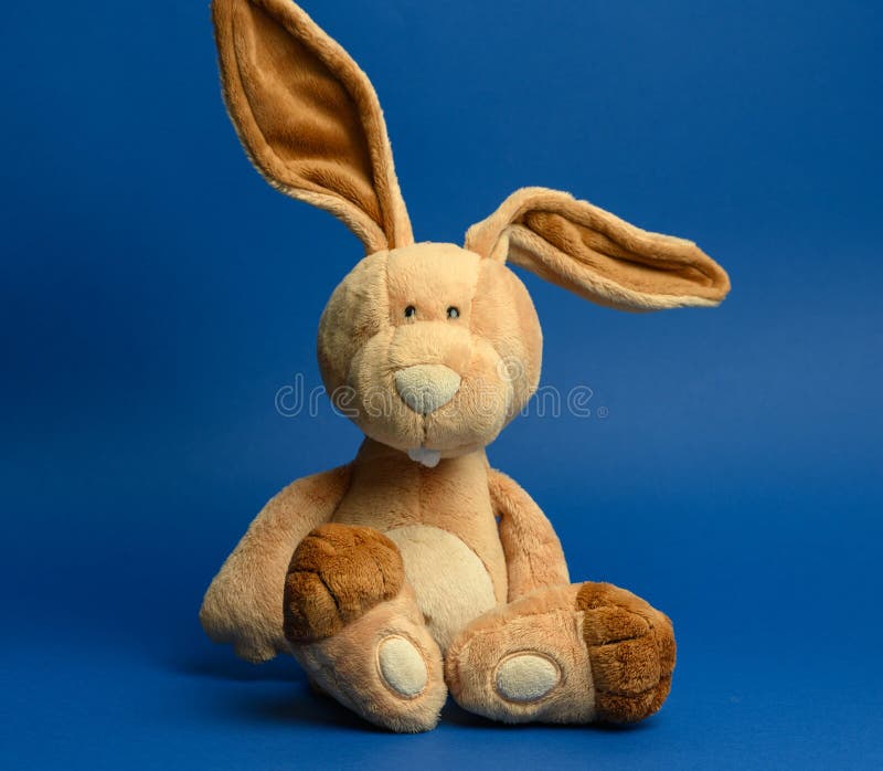 Funny Beige Plush Rabbit with Big Ears and Funny Face Stock Photo ...