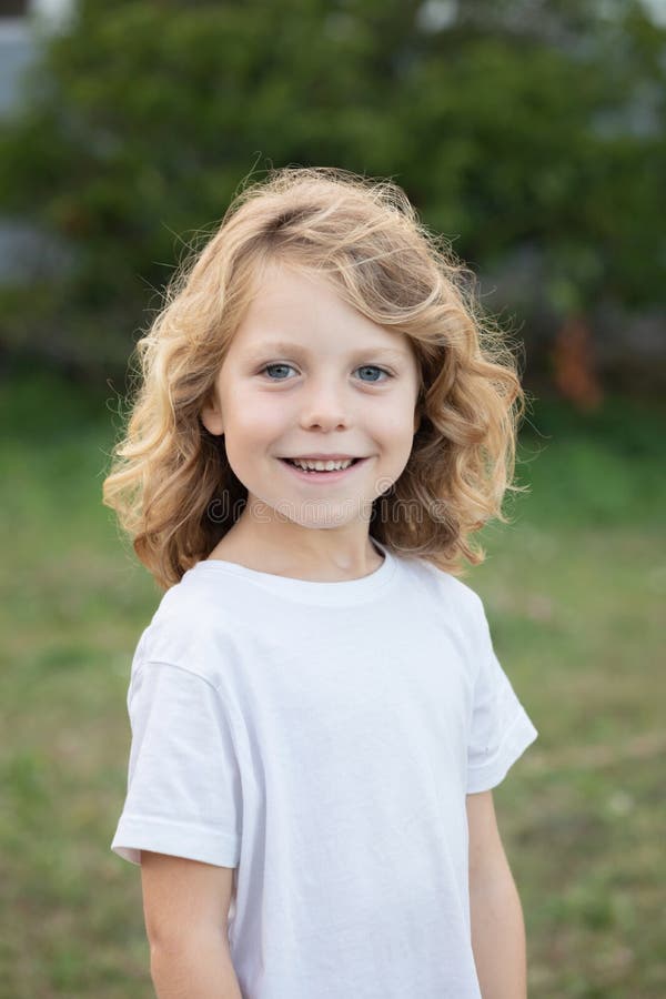 Funny Blond Kid with Long Hair Stock Photo - Image of play, little ...