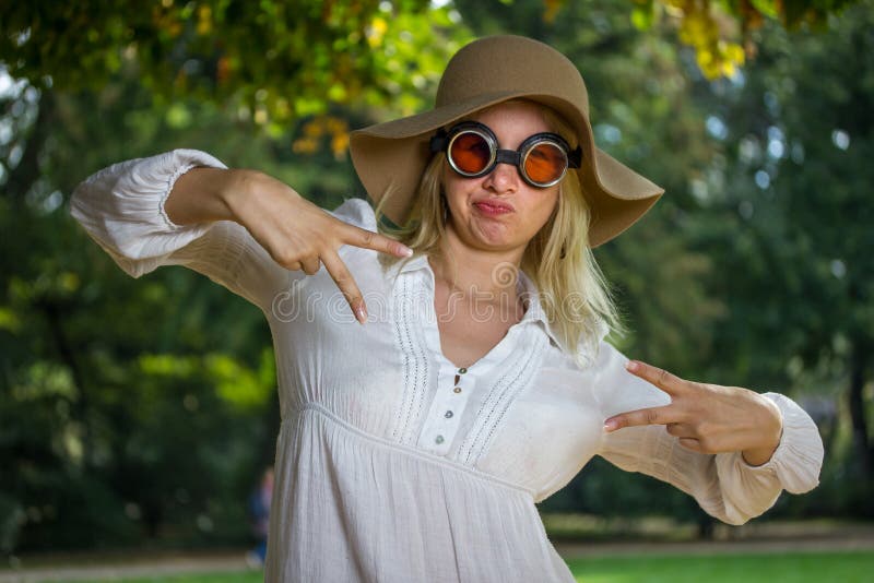 Funny blonde autumn girl stock photo. Image of attractive - 34390540