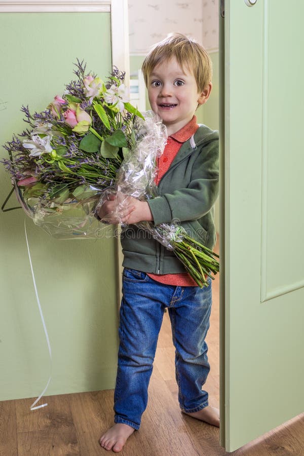 Funny Boy Bringing Flowers Stock Photos - Free & Royalty-Free Stock ...