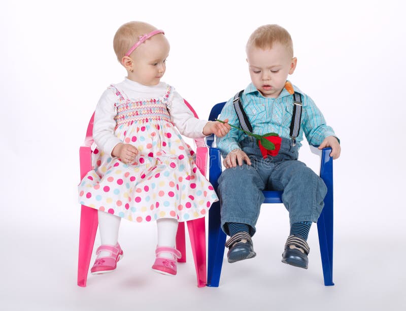 Funny Boy and Girl Sitting on Chairs Back To Back Stock Image - Image ...