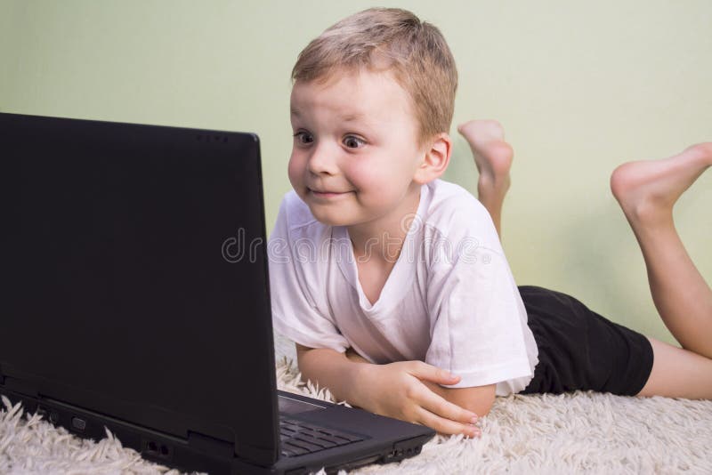 Funny Boy Looking at Laptop in Room Stock Image - Image of face ...