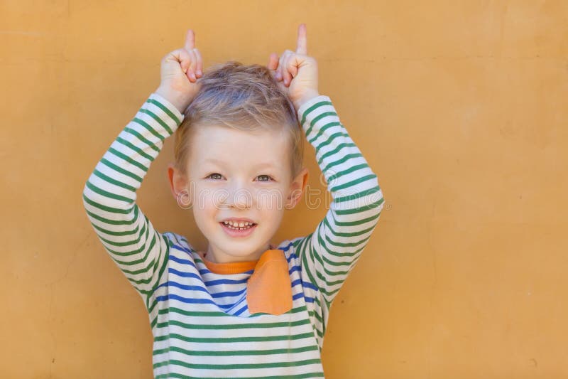 Funny boy stock photo. Image of devil, blond, childhood - 35533104