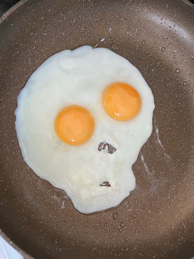 Funny breakfast skull eggs stock photo. Image of dish - 309516864