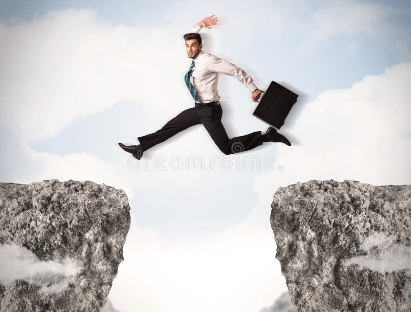 Funny Business Man Jumping Over Rocks with Gap Stock Image - Image of ...