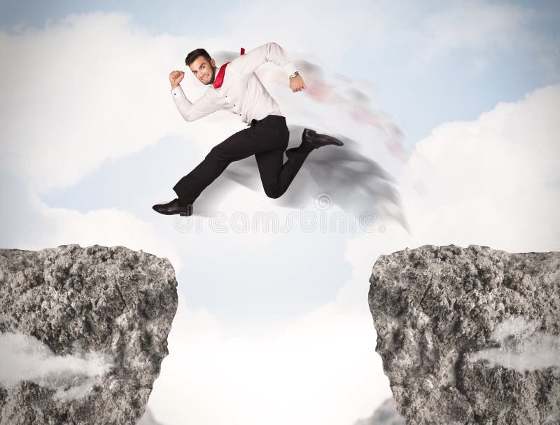 Funny Business Man Jumping Over Rocks with Gap Stock Photo - Image of ...