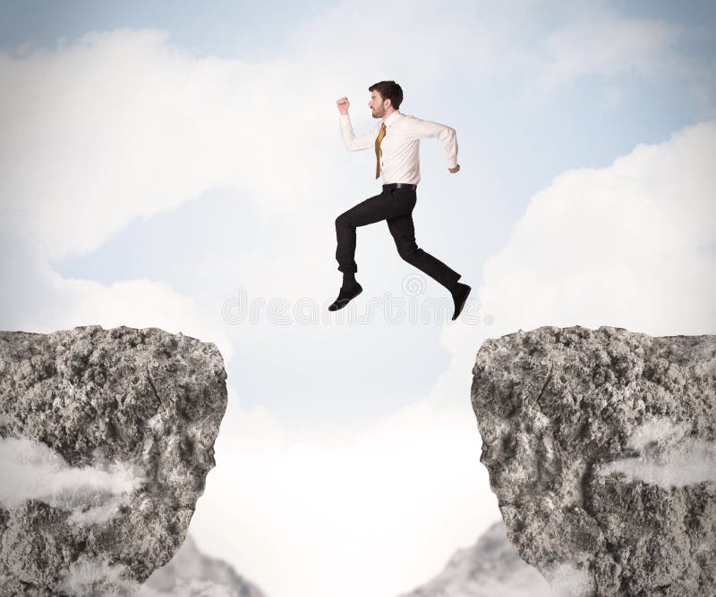 Funny Business Man Jumping Over Rocks with Gap Stock Photo - Image of ...