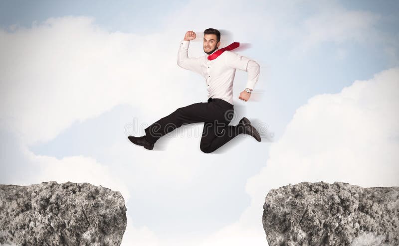 Funny Business Man Jumping Over Rocks with Gap Stock Photo - Image of ...