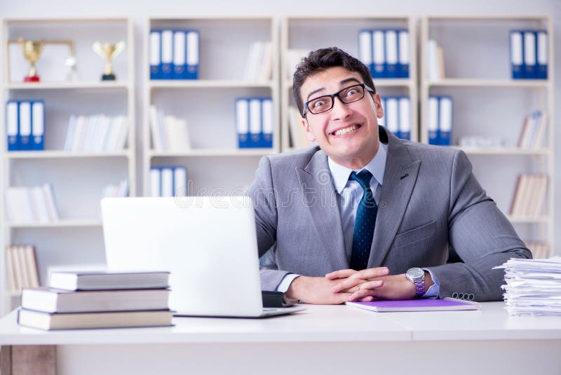 The Funny Businessman Clown Acting Silly in the Office Stock Photo ...