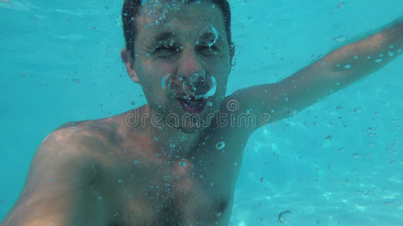 Funny Cheerful Crazy Man Screaming Underwater in the Pool Stock Video ...