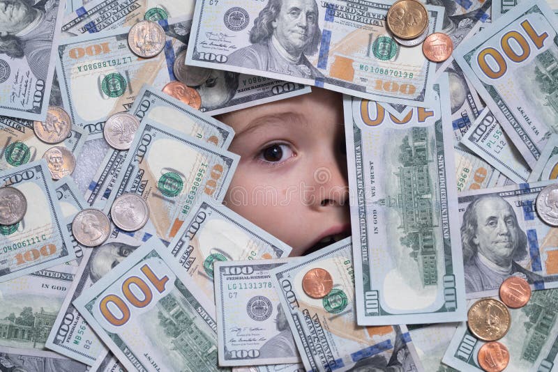 Funny Child Face in Money Dollars Banknotes Background. Stock Photo ...