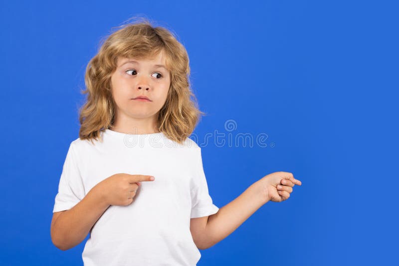 Child Pointing on Empty Sheet of Paper, Isolated on Yellow Background ...