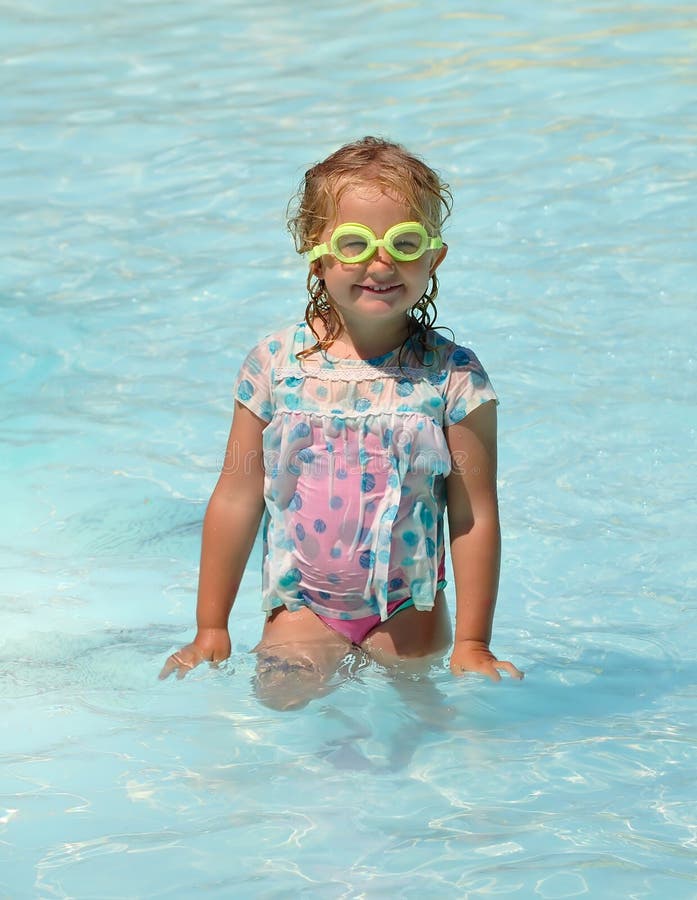 Funny child in the pool stock photo. Image of holidays - 18094008