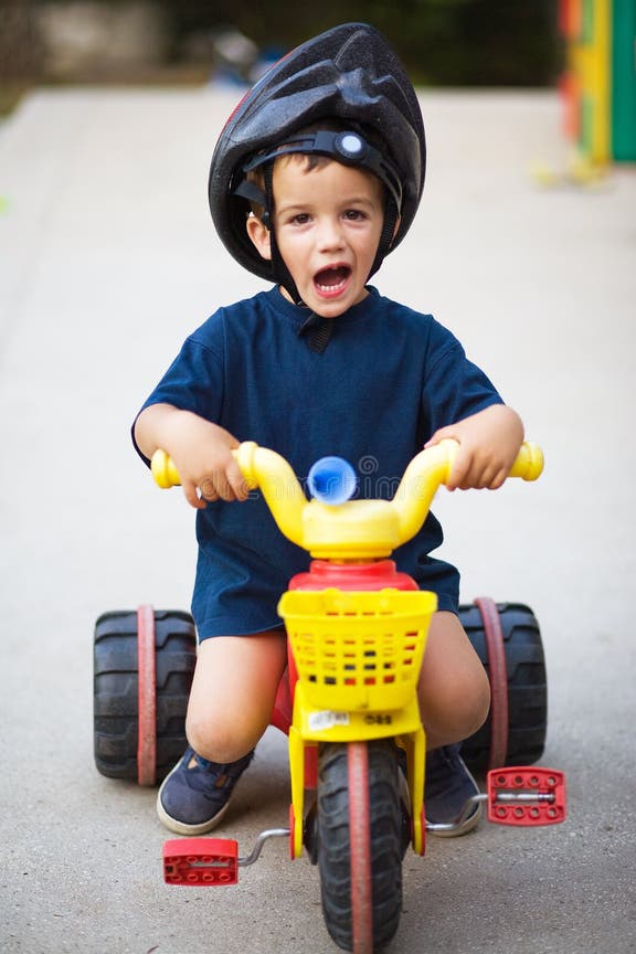 Funny Child Riding Tricycle Stock Image - Image of gear, equipment ...