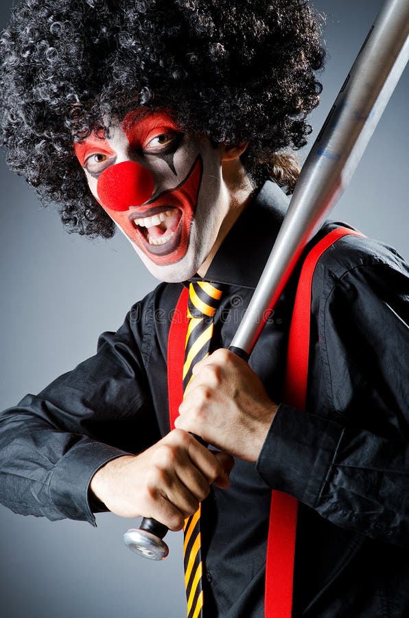 Funny clown with bat stock photo. Image of corporate - 26373532