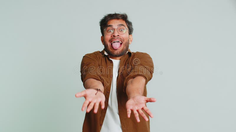 Funny Comical Indian Man Making Silly Facial Expressions Grimacing