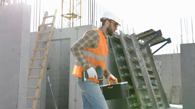 Positive Dance of Builders in Helmet. Construction Engineer in Builder ...