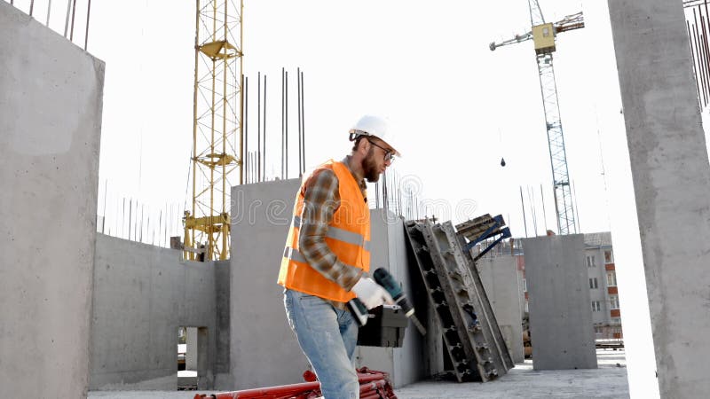 Positive Dance of Builders in Helmet. Construction Engineer in Builder ...