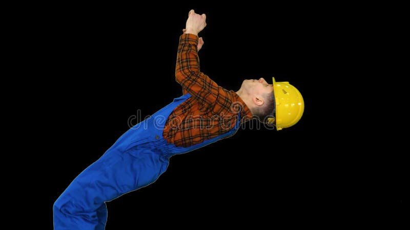 Funny Construction Worker Making a Flip and Loses Safety Hat on a Green ...