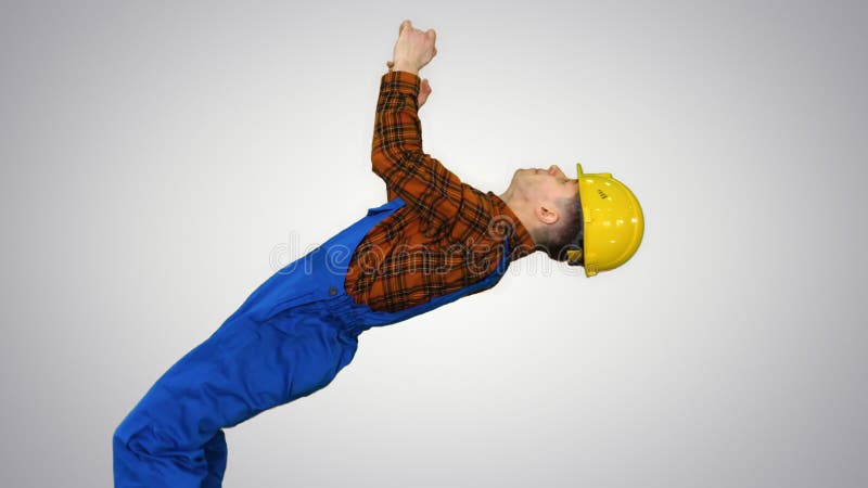 Funny Construction Worker Making a Flip and Loses Safety Hat on ...