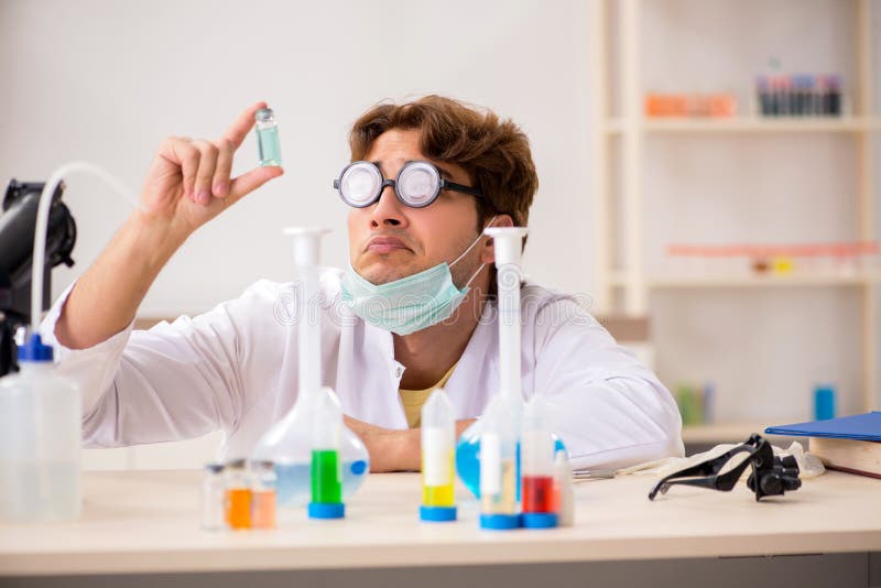 The Funny Crazy Chemist Doing Experiments and Tests Stock Photo - Image ...