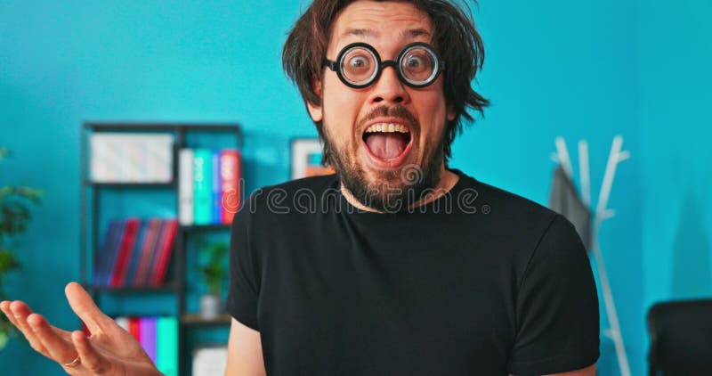 Funny, Crazy, Strange Boy Sitting on Table with Tablet in Hand, Clicks ...