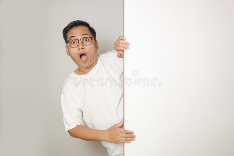 Funny Curious Man Peeking Behind Wall Stock Photos - Free & Royalty ...