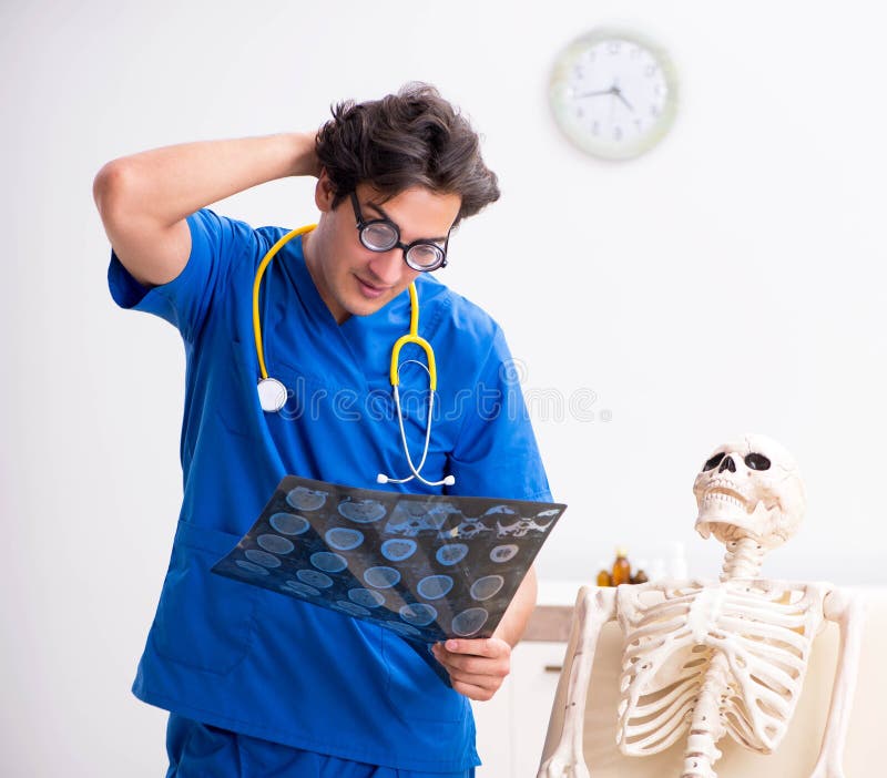 Funny Doctor with Skeleton in Hospital Stock Photo - Image of medic ...