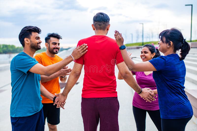 Funny Eastern Ethnic People Exercising Together Outdoor Stock Photo ...
