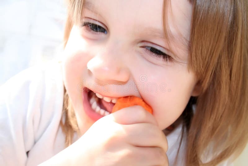 Funny eating carrot stock photo. Image of childhood, enjoying - 4589368