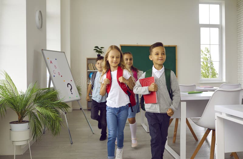 Funny Elementary School Students Walking Out of Classroom Together ...