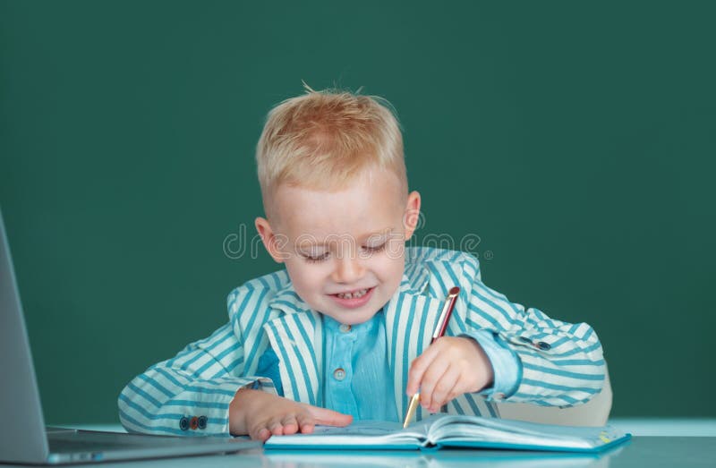 Funny Face of Little Student of Primary School Study in Classroom at ...