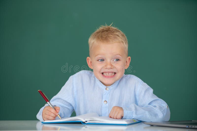 Funny Face of Little Student of Primary School Study in Classroom at ...