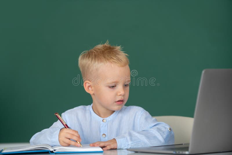Funny Face of Little Student of Primary School Study in Classroom at ...
