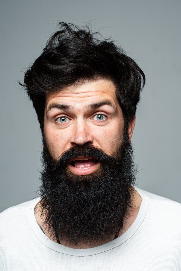 Surprised Handsome Bearded Man In Shocked Surprise Expression Wow