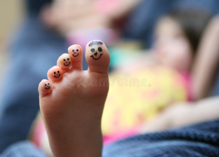 Funny face toes stock image. Image of human, lying, feet - 17504611