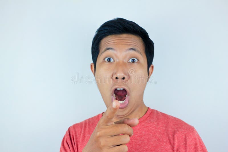 Funny Facial Expression of Asian Man Shocked and Surprised while Pointing at the Camera Stock ...