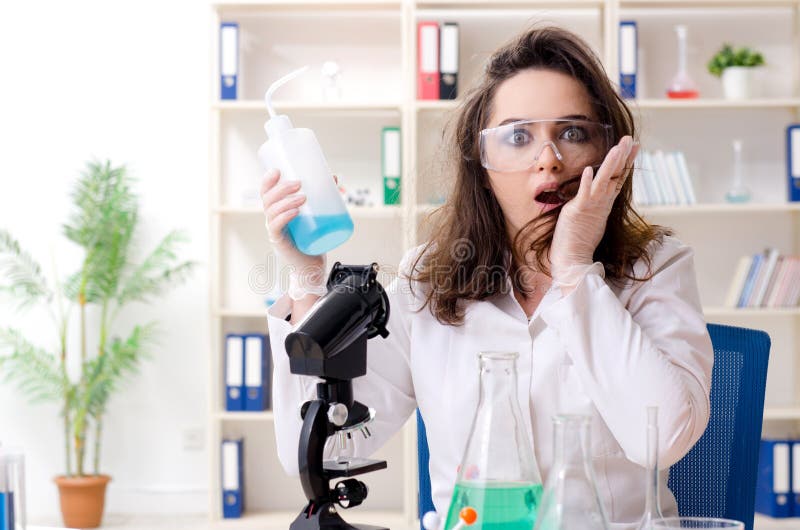 Funny Female Chemist Working in the Lab Stock Image - Image of liquid ...