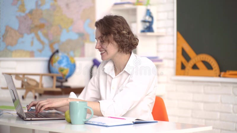 Funny Female Young Teacher in the Classroom. Student in College ...